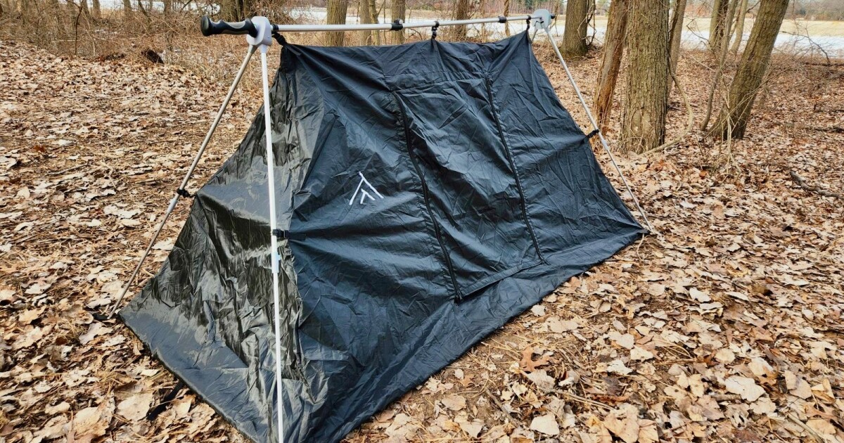Double-duty outdoor tool combines a trekking pole and tent in one ...